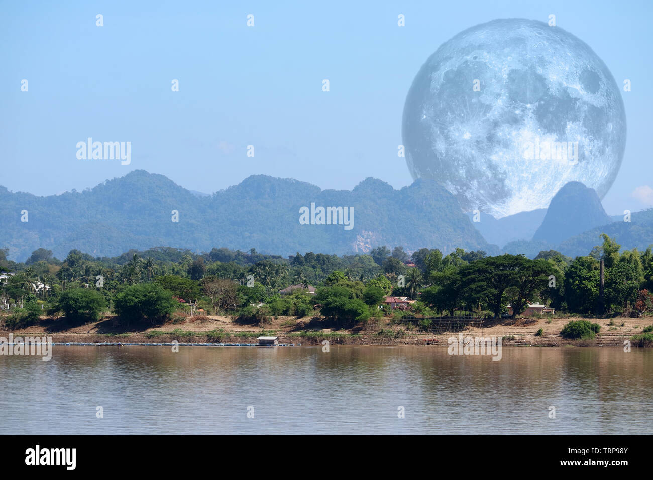 full milk moon back on silhouette mountain and river, Elements of this ...