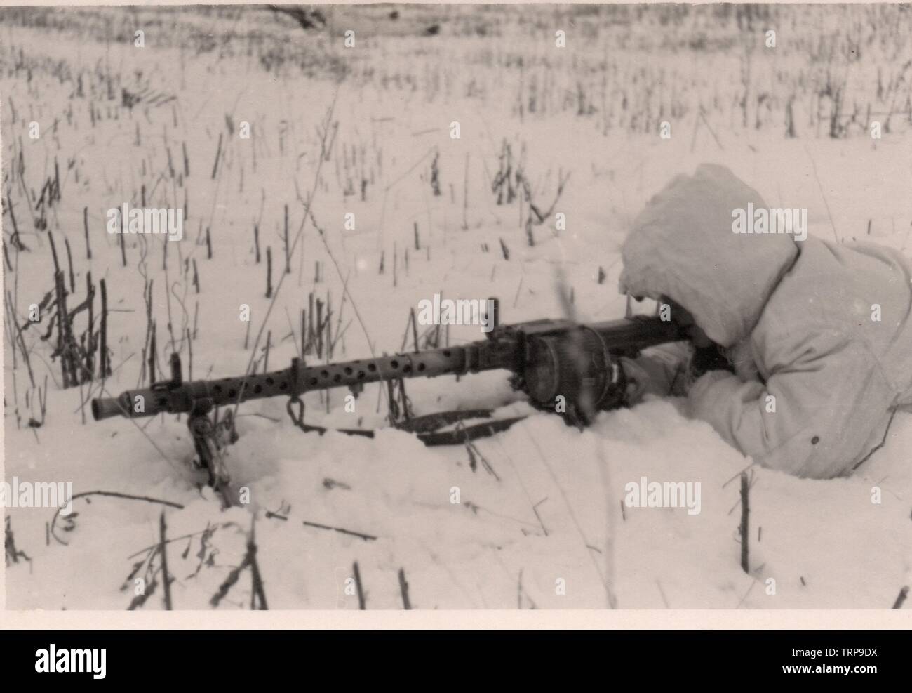 German Soldier in Snow Camouflage Parka with Light MG on the Eastern ...