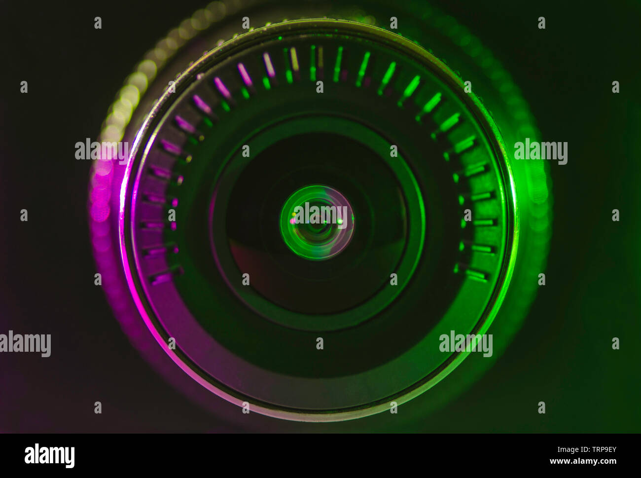 Camera lens with green pink color, approximate, photo, macro Stock ...