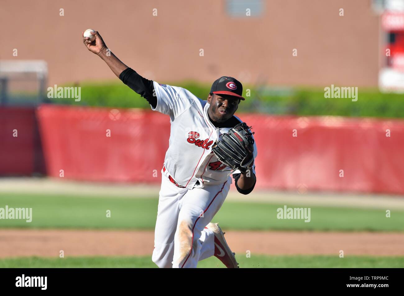 Pitcher delivering a pitch to a waiting hitter. USA Stock Photo - Alamy