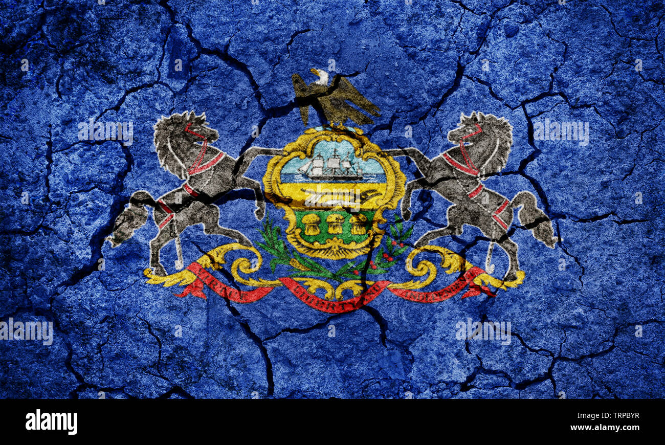 Flag of the Commonwealth of Pennsylvania on dry earth ground texture ...