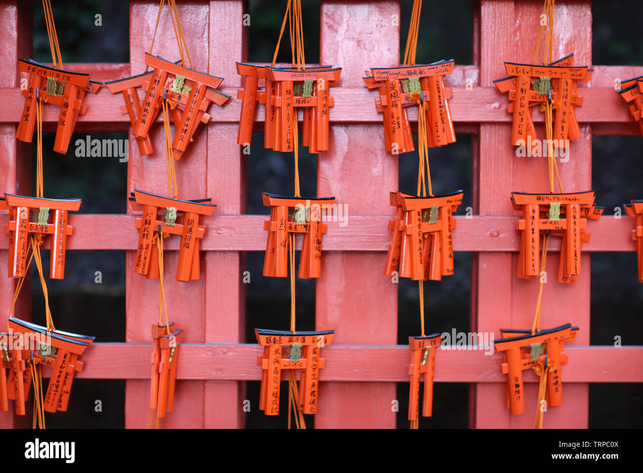Small souvenir torii-gates to visitors at the stand on the territory of ...
