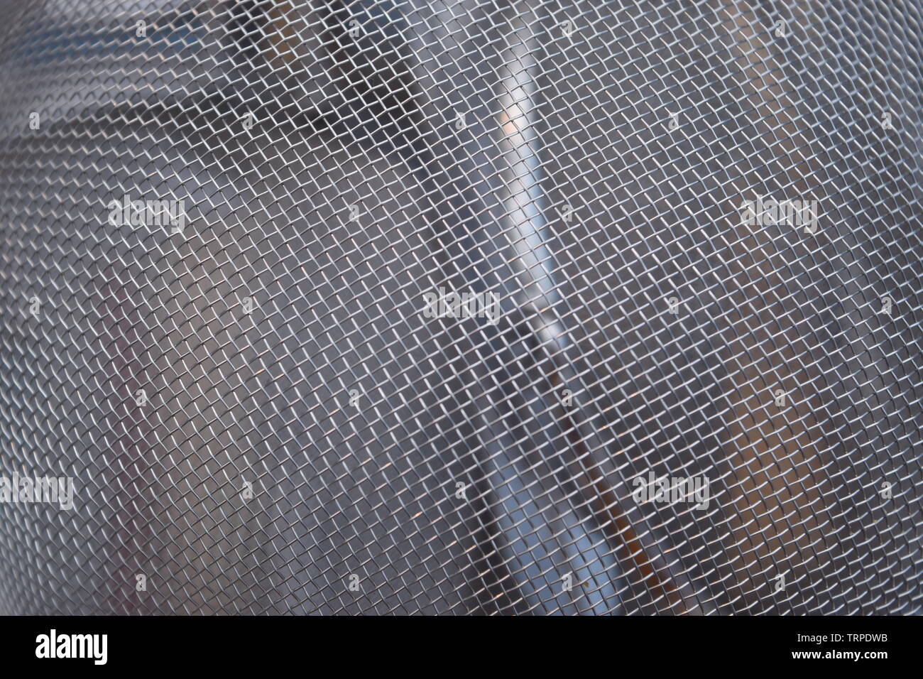 Macro view up of a silver kitchen sieve Stock Photo - Alamy