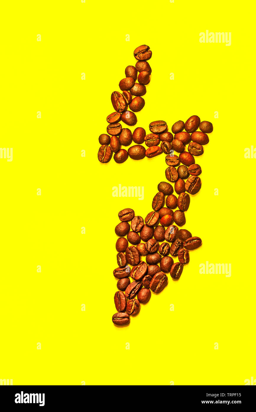 Isolated lightning shape made with coffee beans. Symbol of a superpower ...