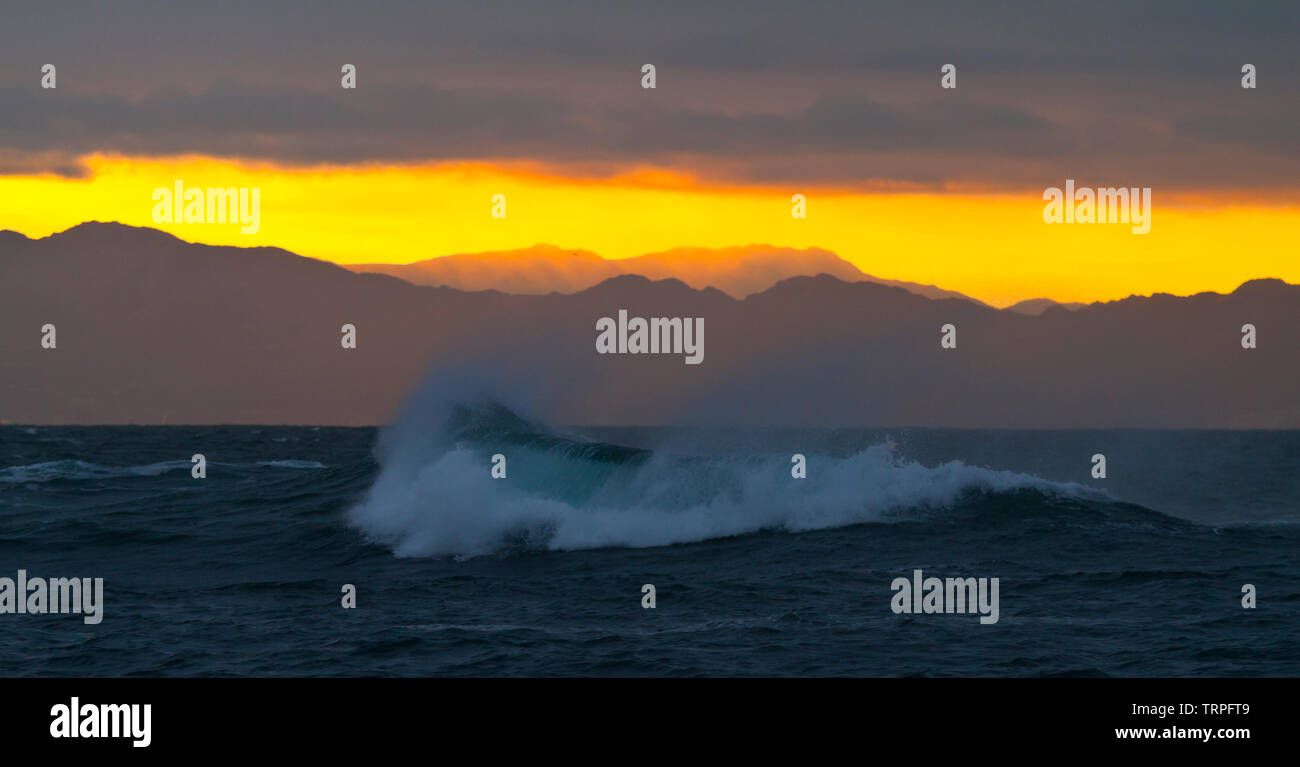Lights at the break of down, False Bay, South Africa, Africa Stock ...