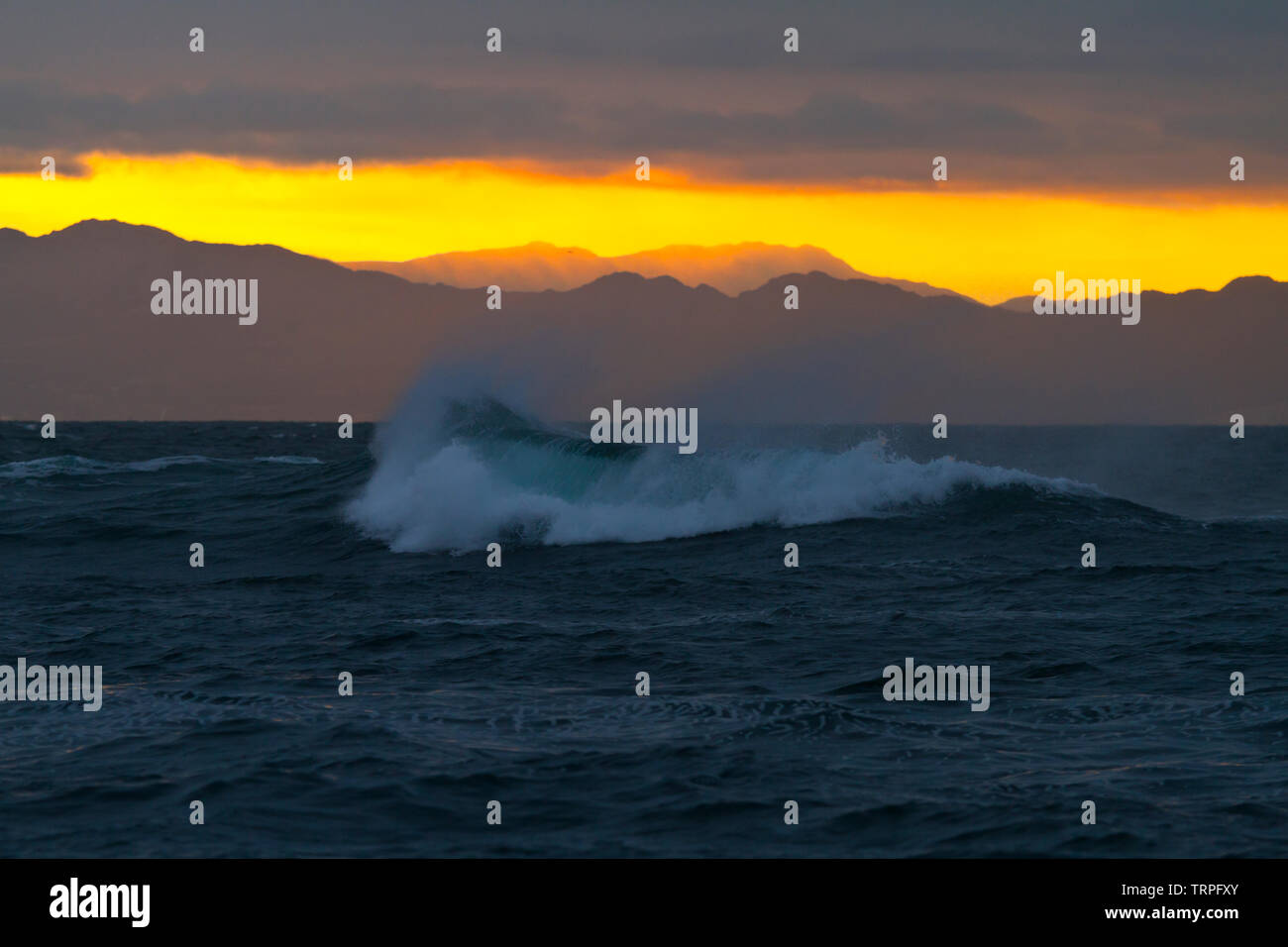 Lights at the break of down, False Bay, South Africa, Africa Stock ...