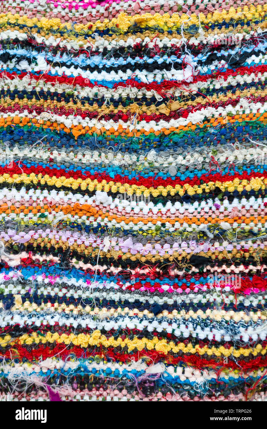 Colorful textile abstract background in a full frame close-up of ...