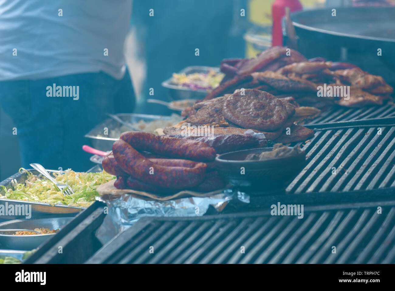 Serbian grilled street food, meat on barbecue, selective focus Stock ...