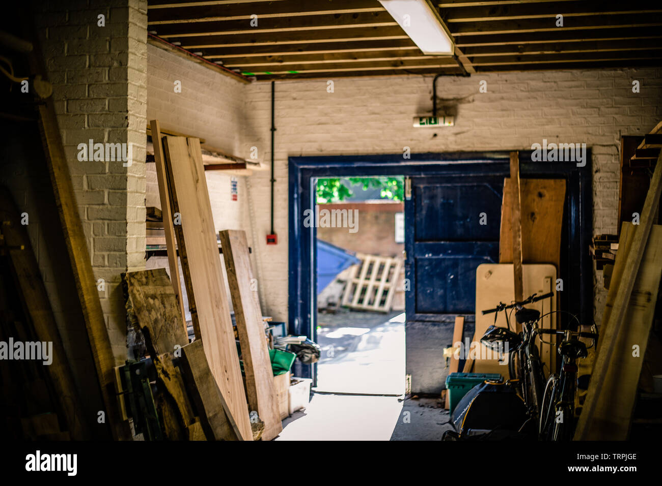 planks of timber in working wood store Stock Photo - Alamy