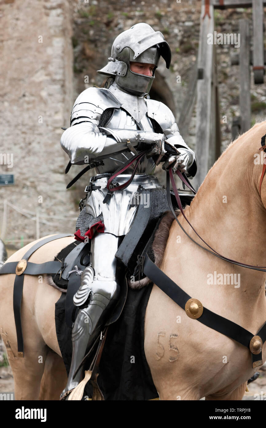 Close-up of a mounted Knight in full Armour getting ready for an ...
