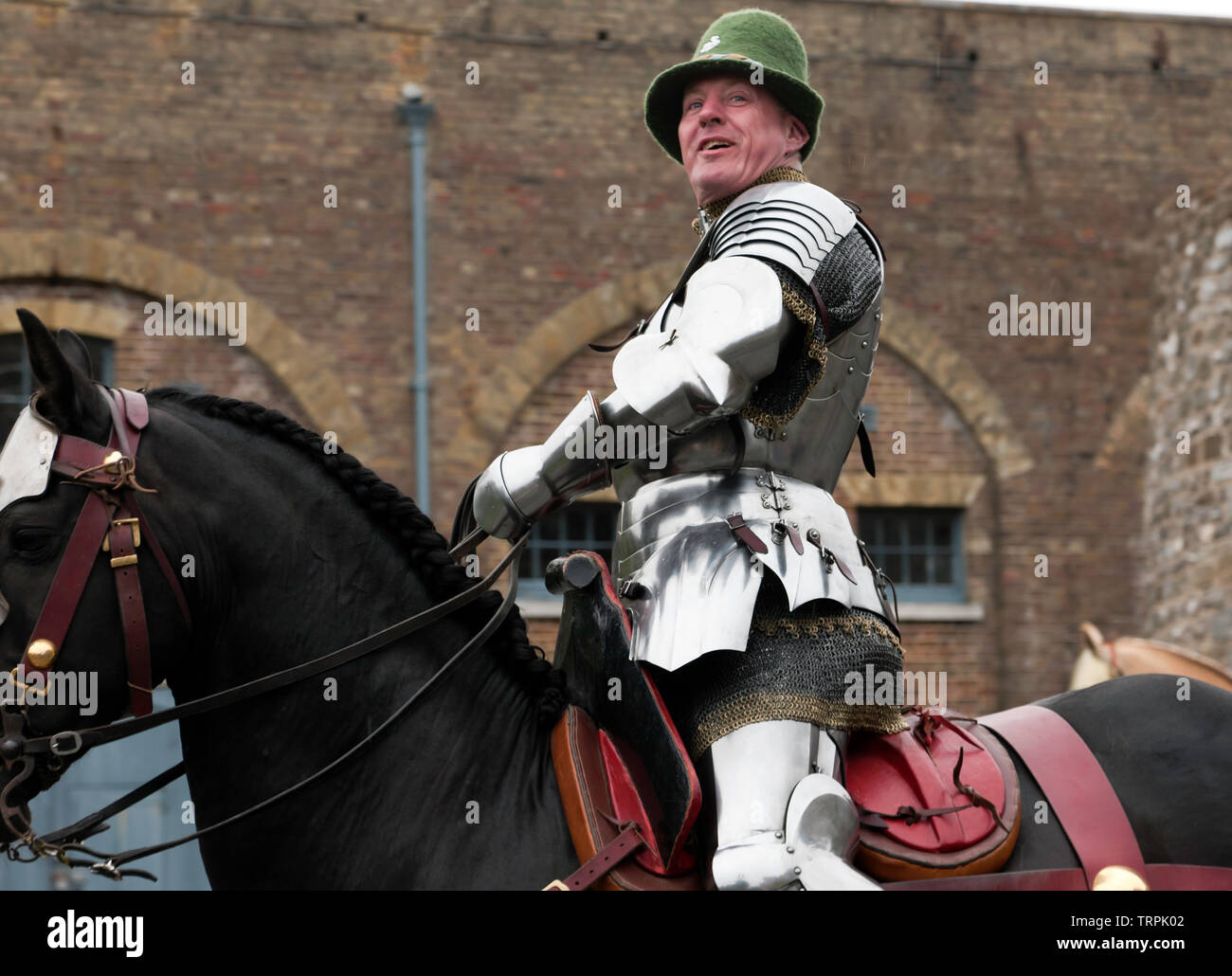 Close-up of a mounted Knight in full Armour getting ready for an ...