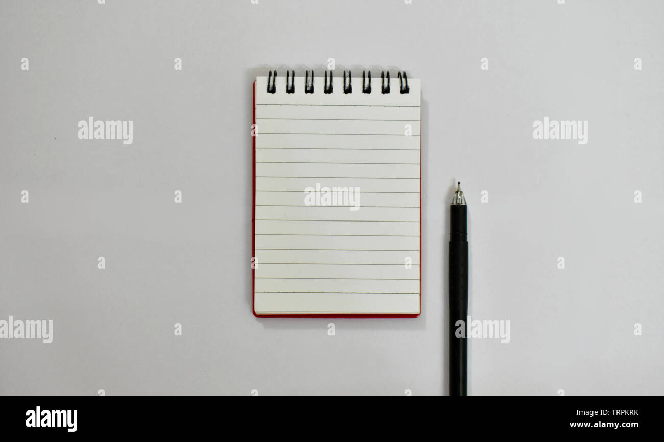 Picture of a notepad with a pen Stock Photo - Alamy