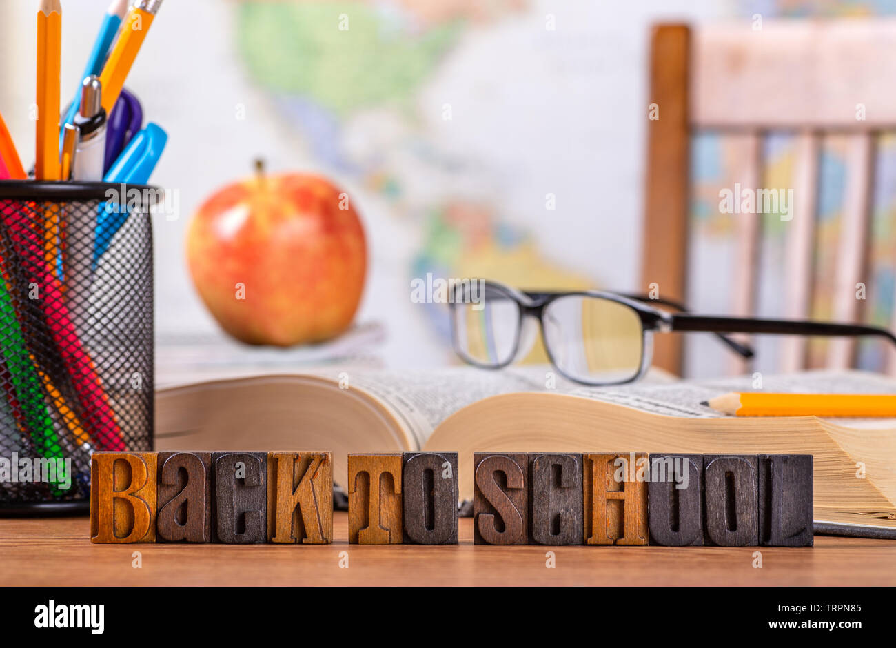 Closeup of Back To School text on a classroom desk Stock Photo - Alamy