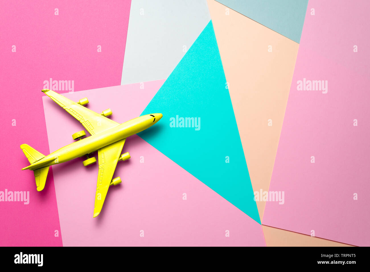 yellow passenger jet airplane, minimal concept, multicolor paper funny ...