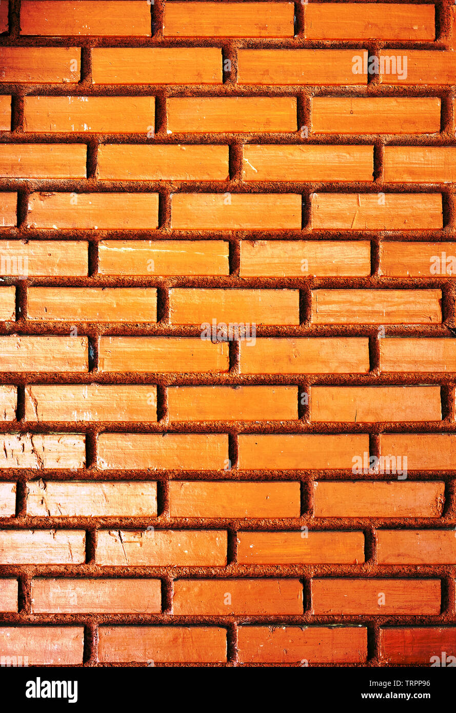 Bricks wall burnt orange background Stock Photo - Alamy