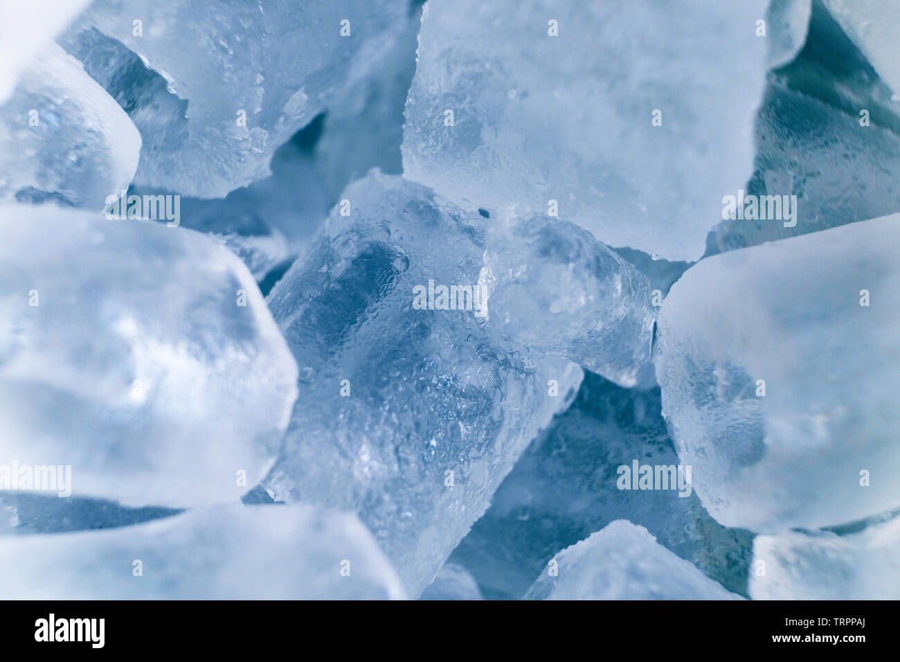 Ice cube texture color soft blue background Stock Photo - Alamy