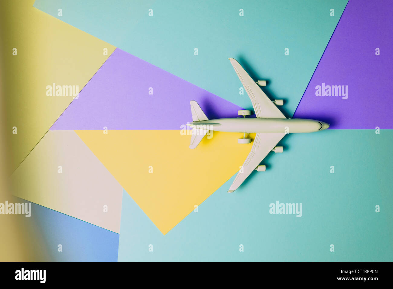 Passenger jet airplane, minimal concept, multicolor paper funny ...