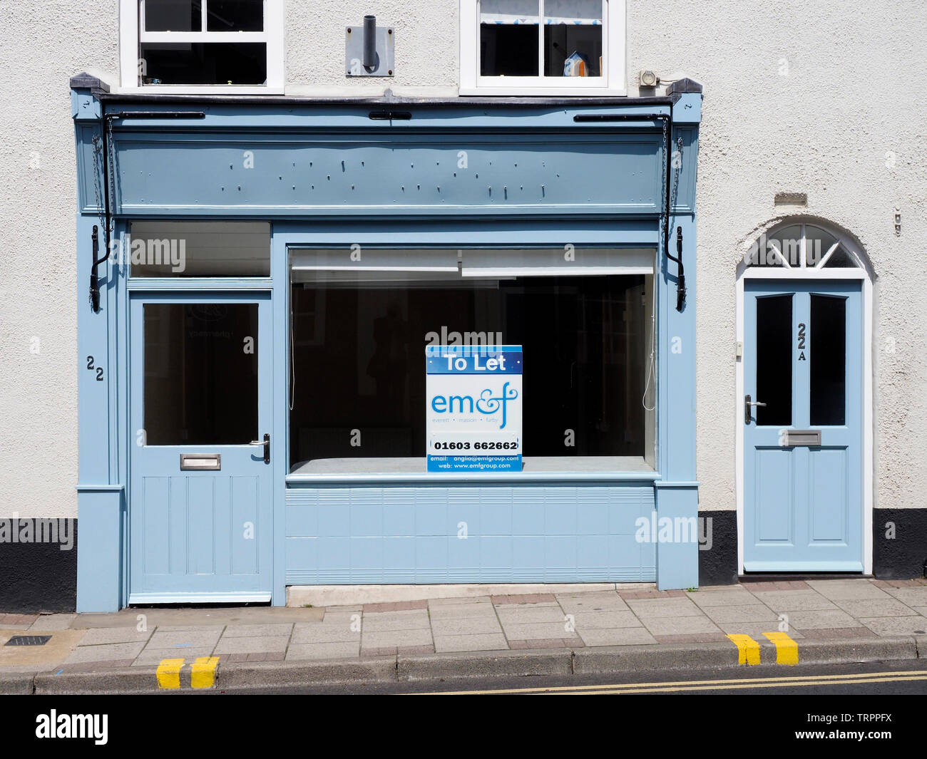 Closed shops in the market town of Holt, a pretty town in North Norfolk ...