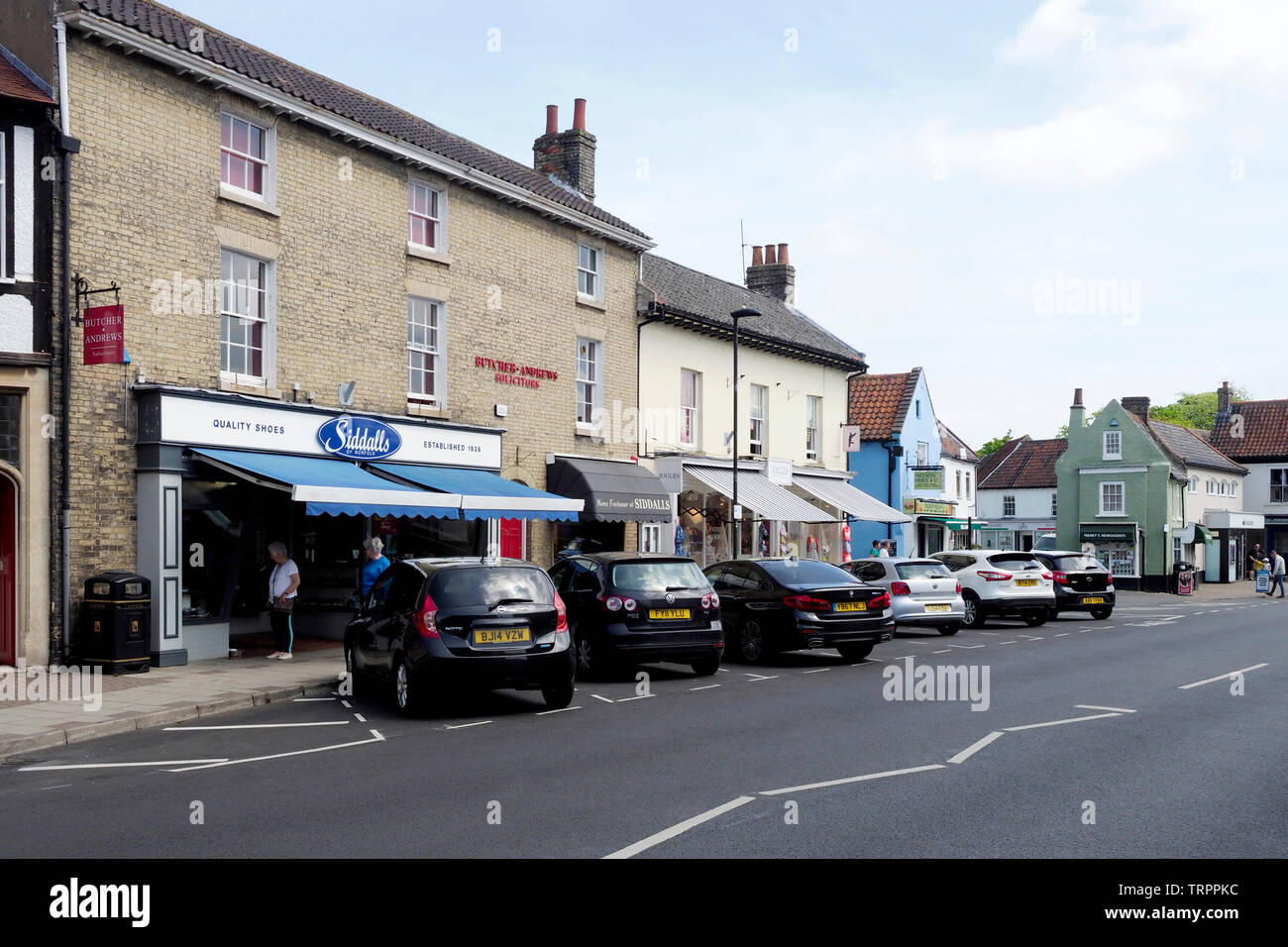 Quaint Georgian buildings in the North Norfolk market town of Holt, a ...