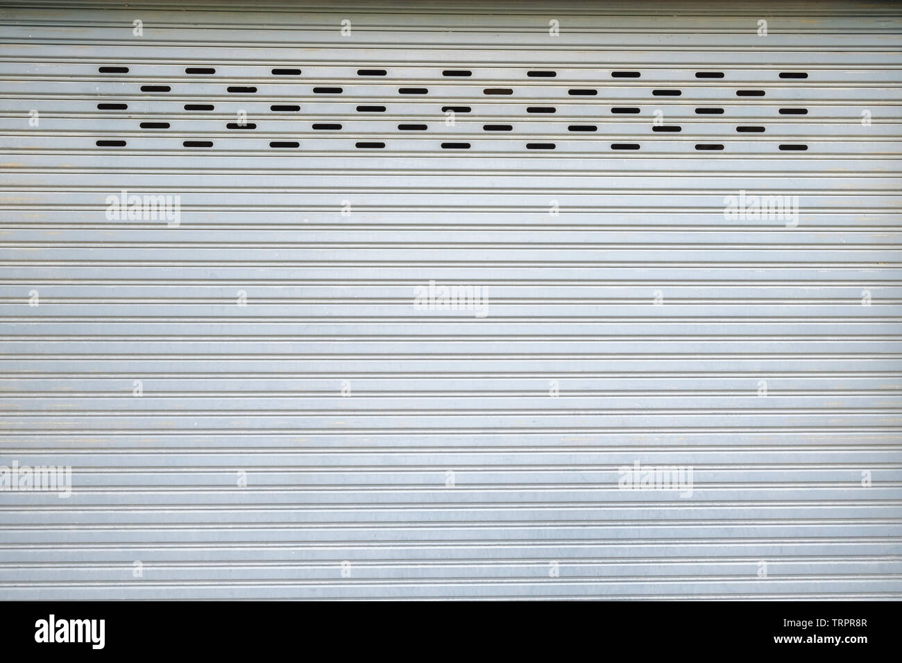 Garage door grey pattern using pull up Stock Photo - Alamy