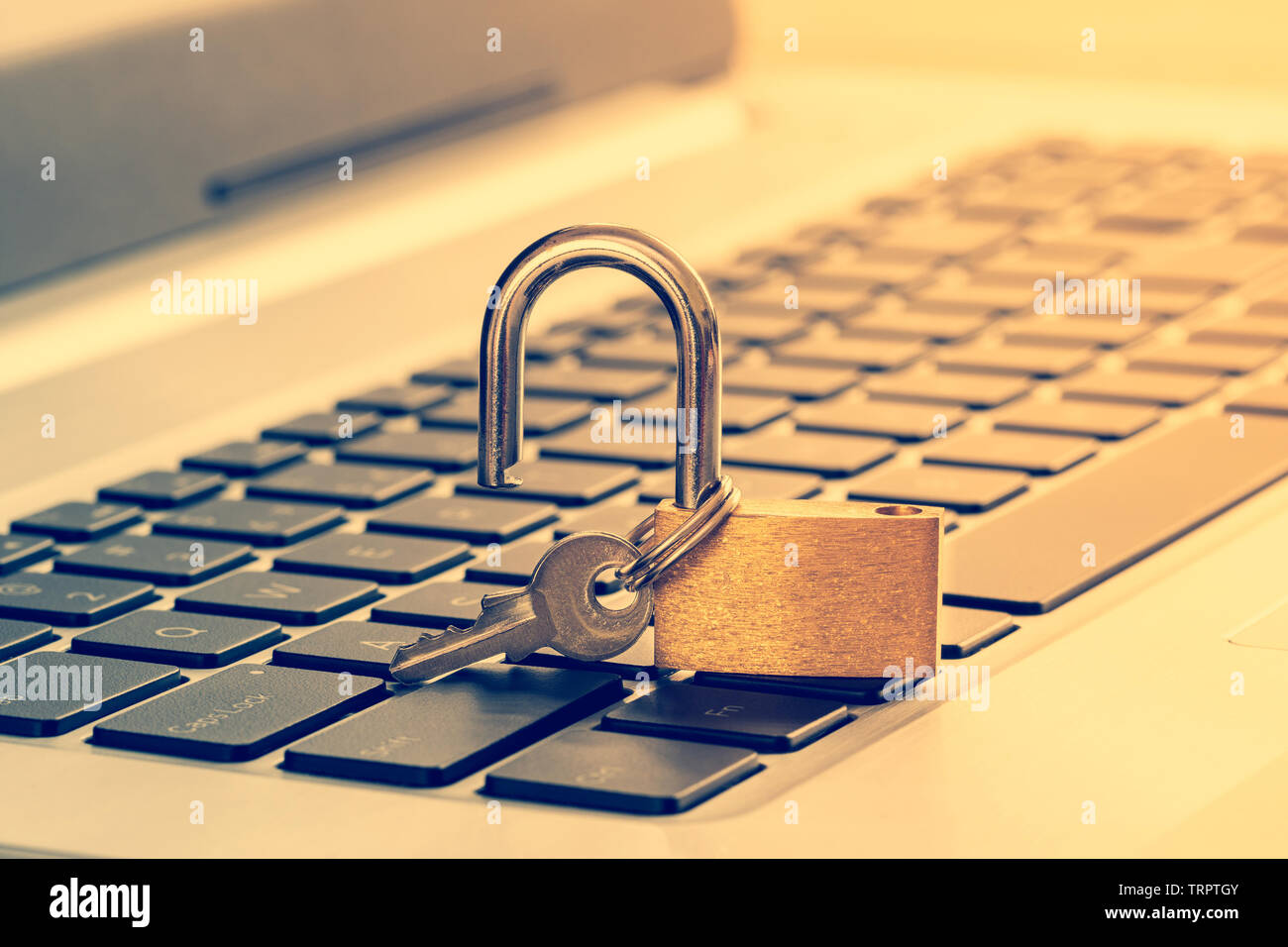 Computer security concept with unlocked padlock on the keyboard Stock ...