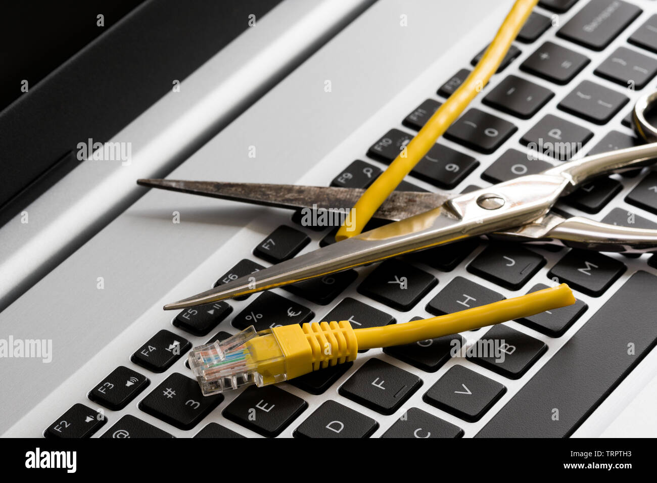 Laptop with cut internet cable. Concept of internet censorship Stock ...