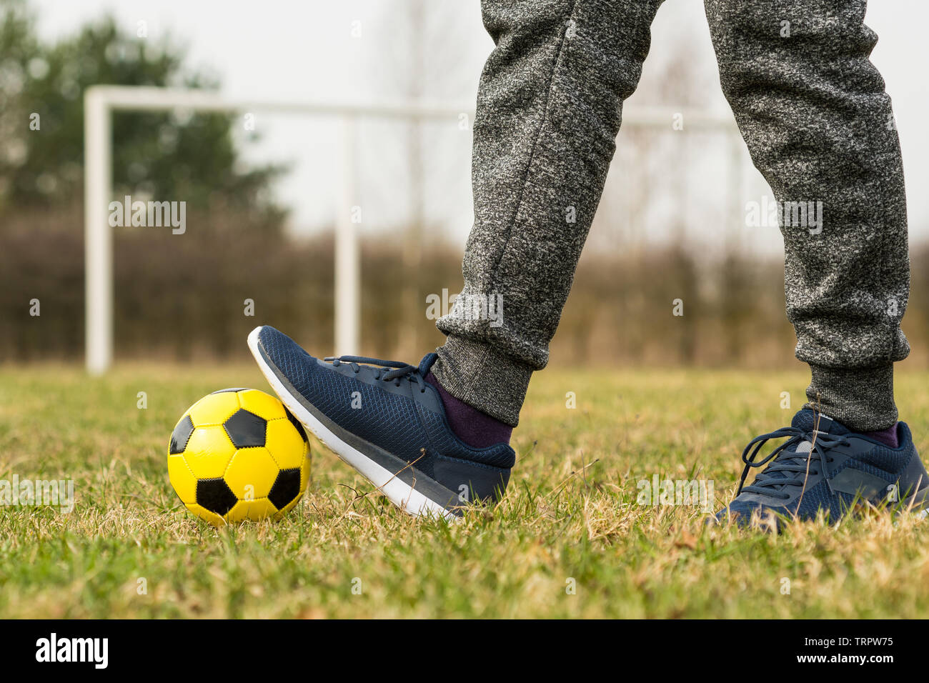 Man with a football at his feet hi-res stock photography and images - Alamy