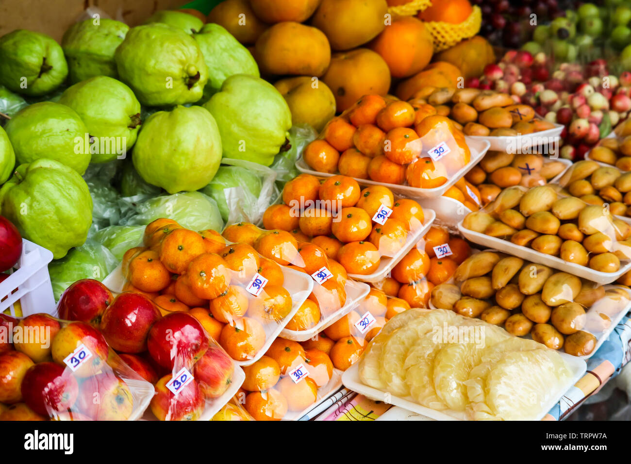 fresh several fruits on street food in rural of local market Chonburi ...