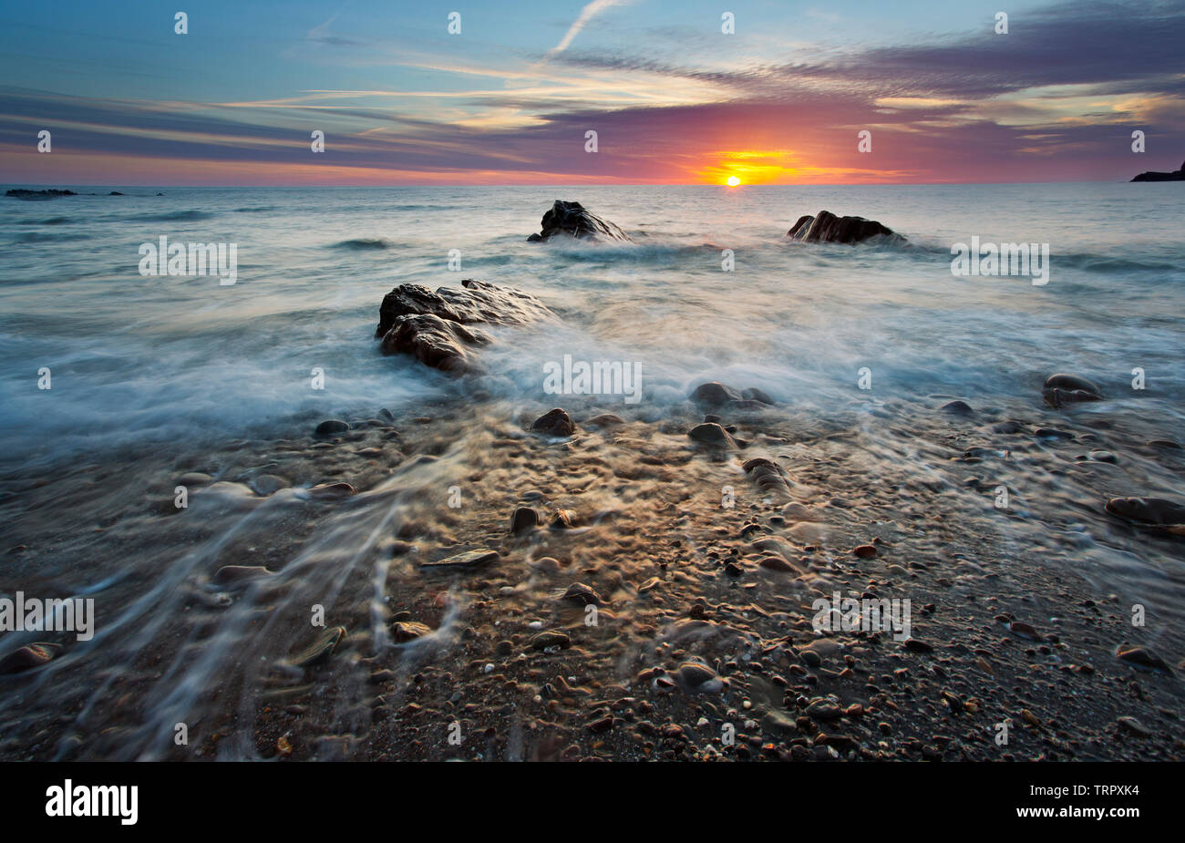 Sunset at Widemouth bay in Cornwall.England,UK Stock Photo - Alamy