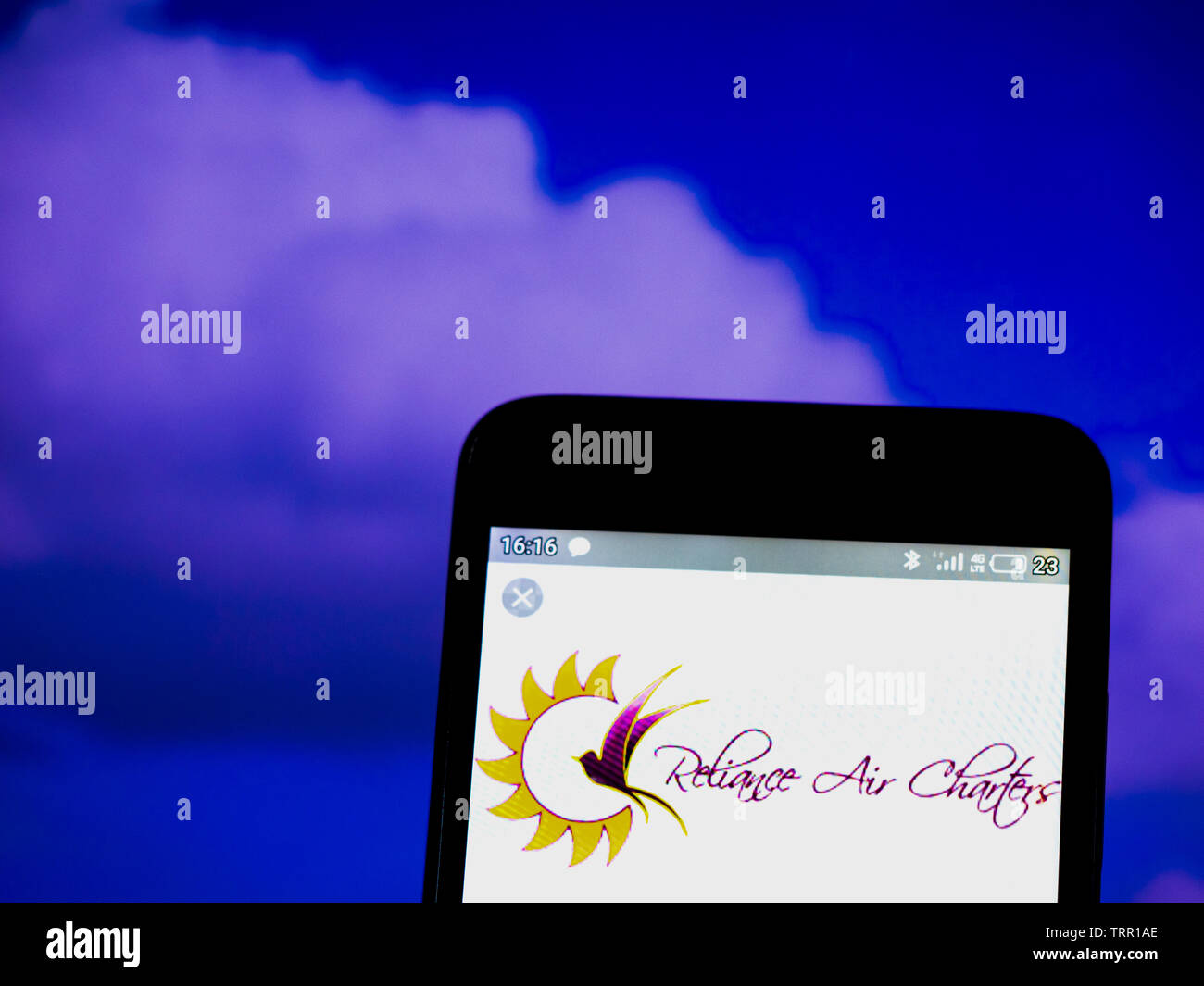 In this photo illustration the Reliance Air Charters logo is seen ...