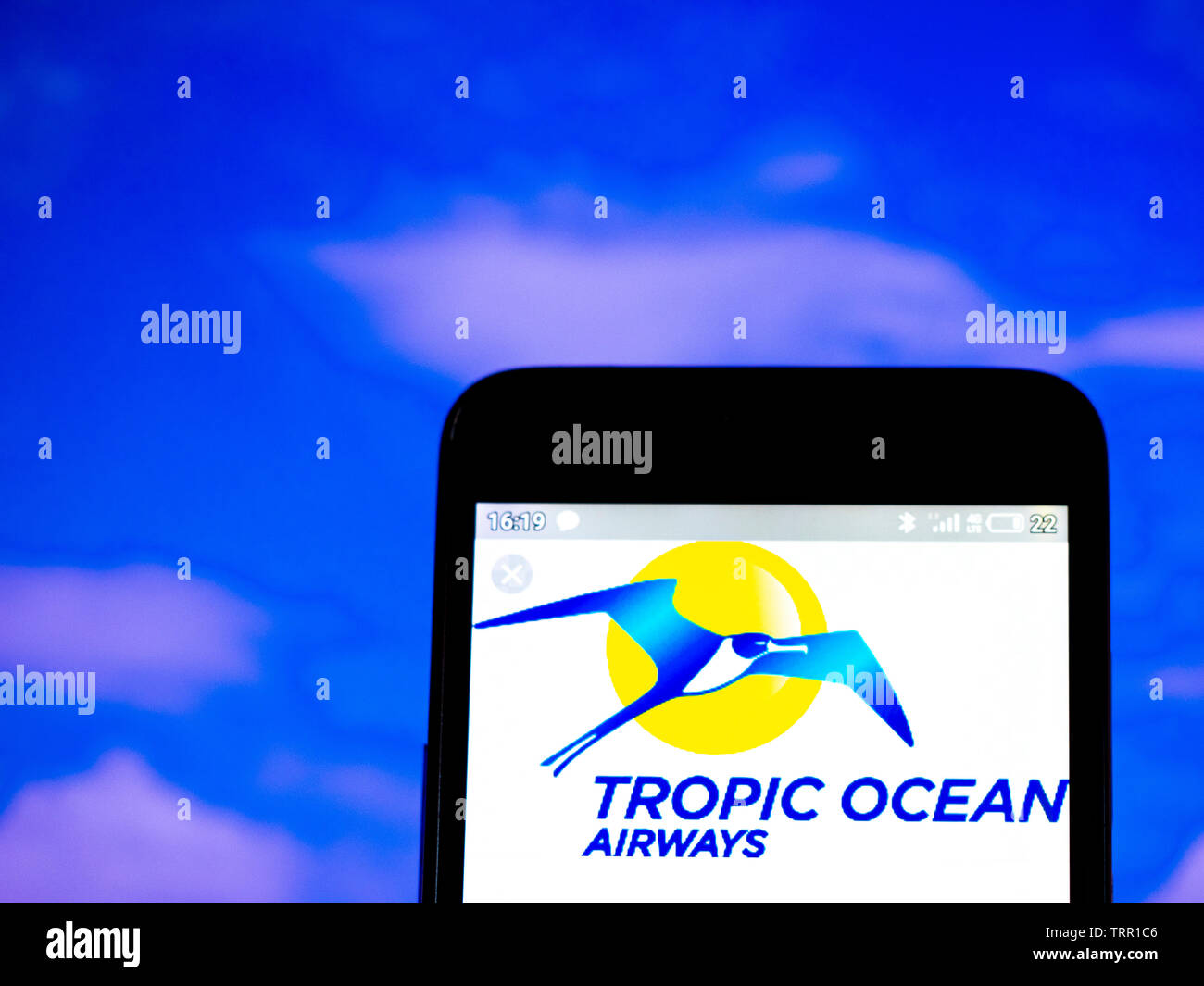 In this photo illustration the Tropic Ocean Airways logo is seen ...