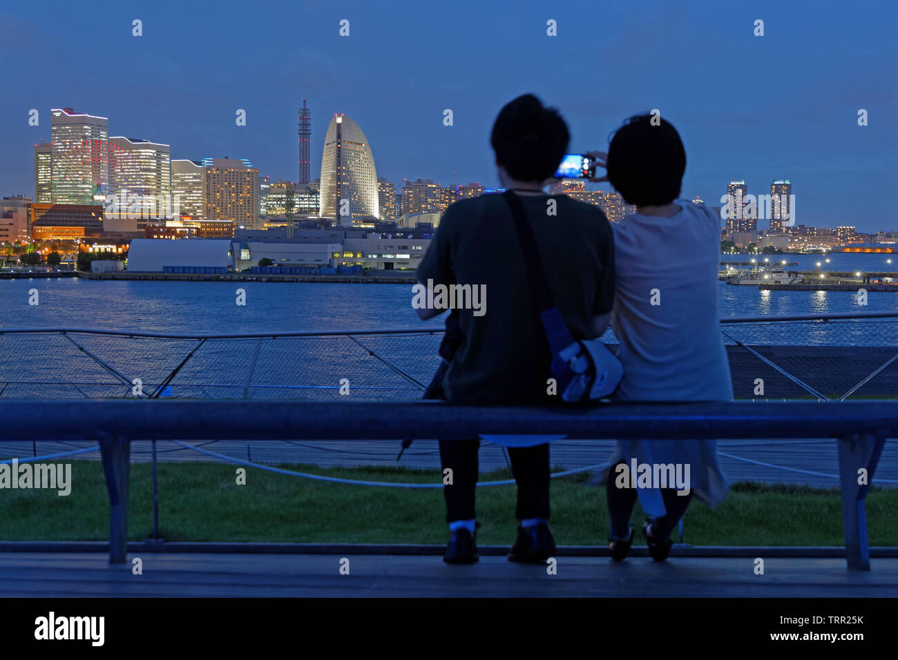 YOKOHAMA, JAPAN, May 20, 2019 : Couple admires the skyline view of ...