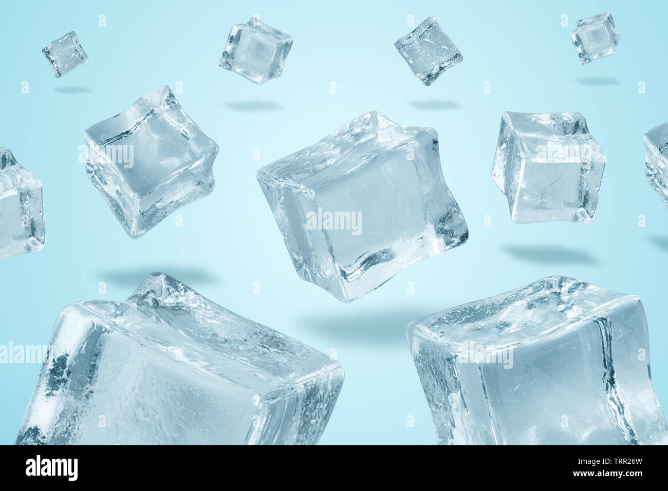 levitating ice cubes over blue background, cold screensaver, ingredient ...