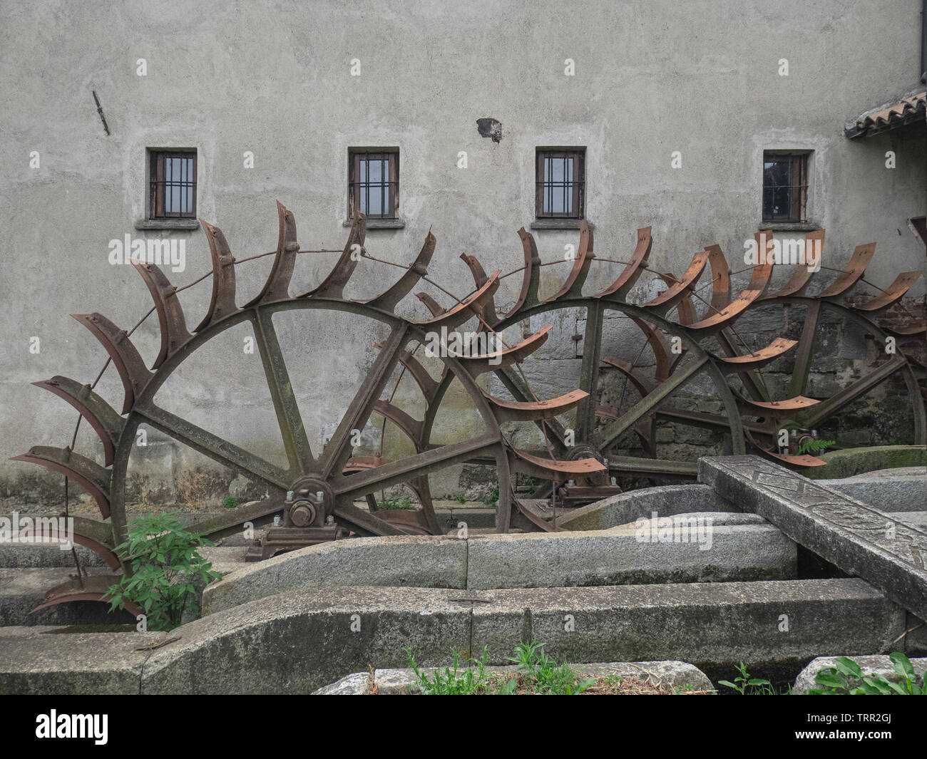 wheels of an old water mill Stock Photo - Alamy