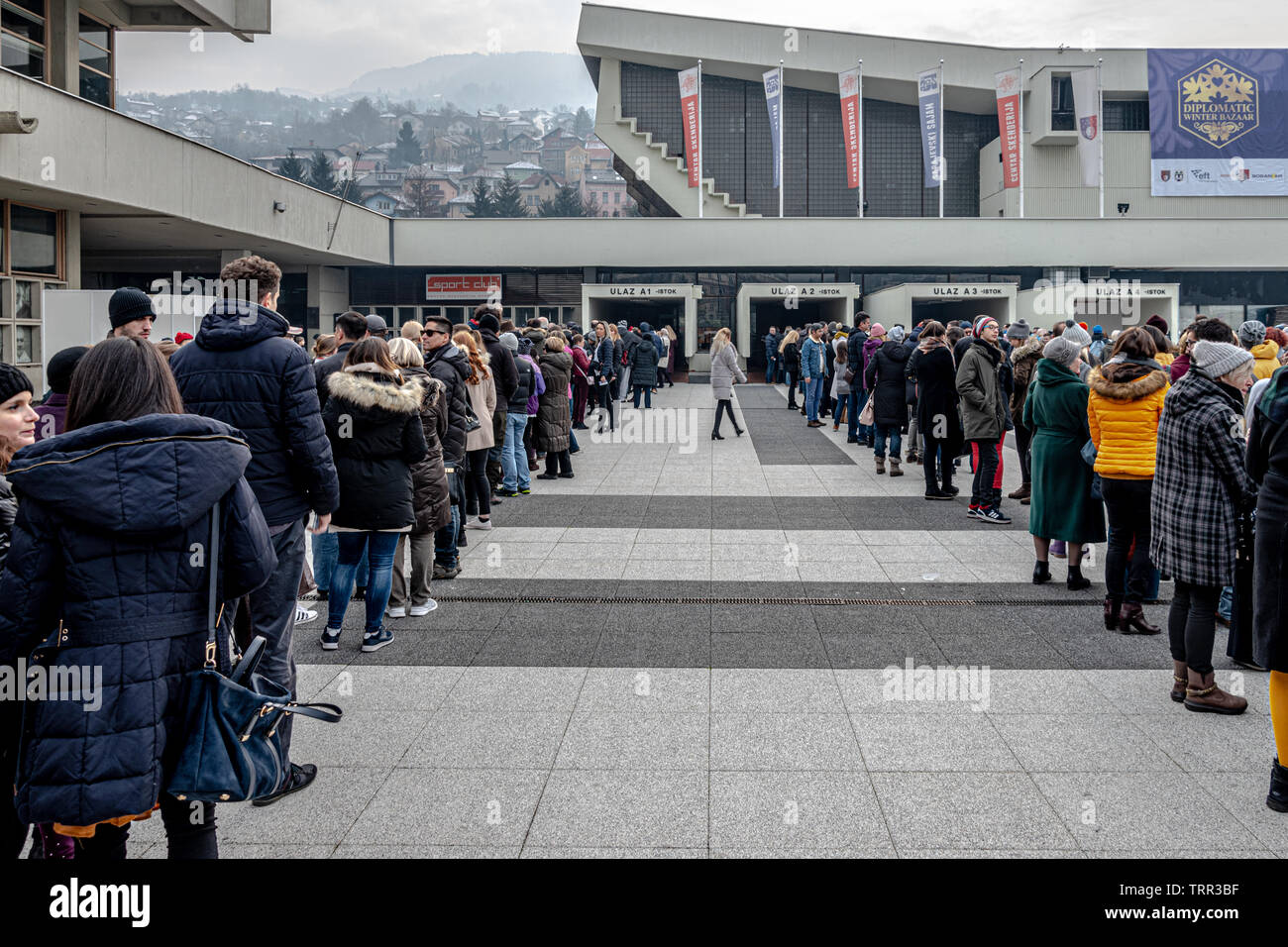 Waiting in a row Stock Photo - Alamy