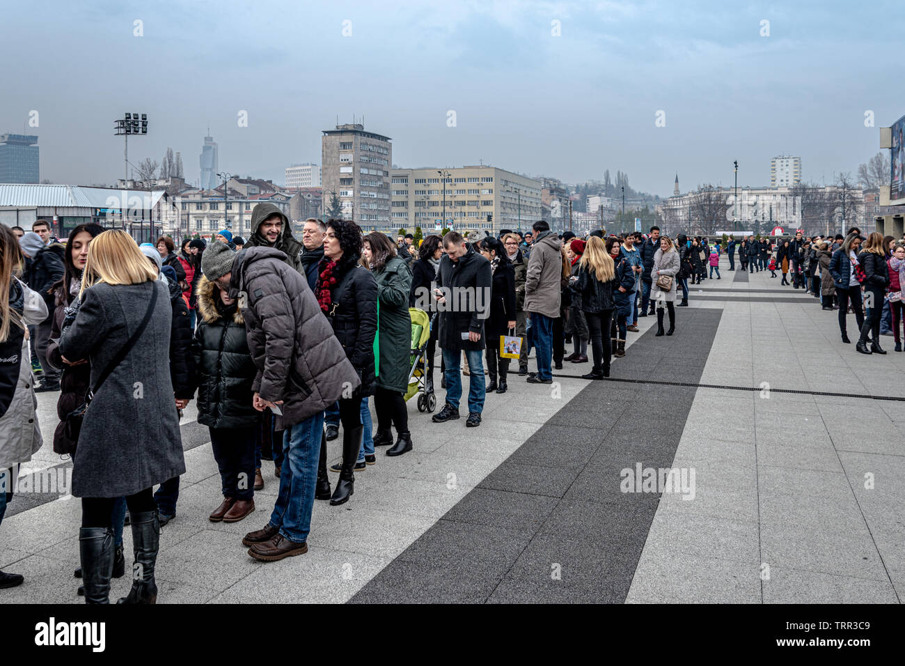 Waiting in a row Stock Photo - Alamy