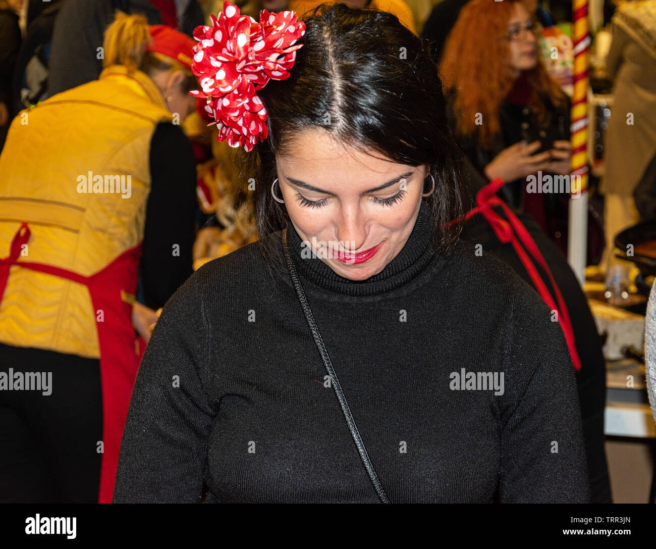 Girl on Spanish stall Stock Photo - Alamy
