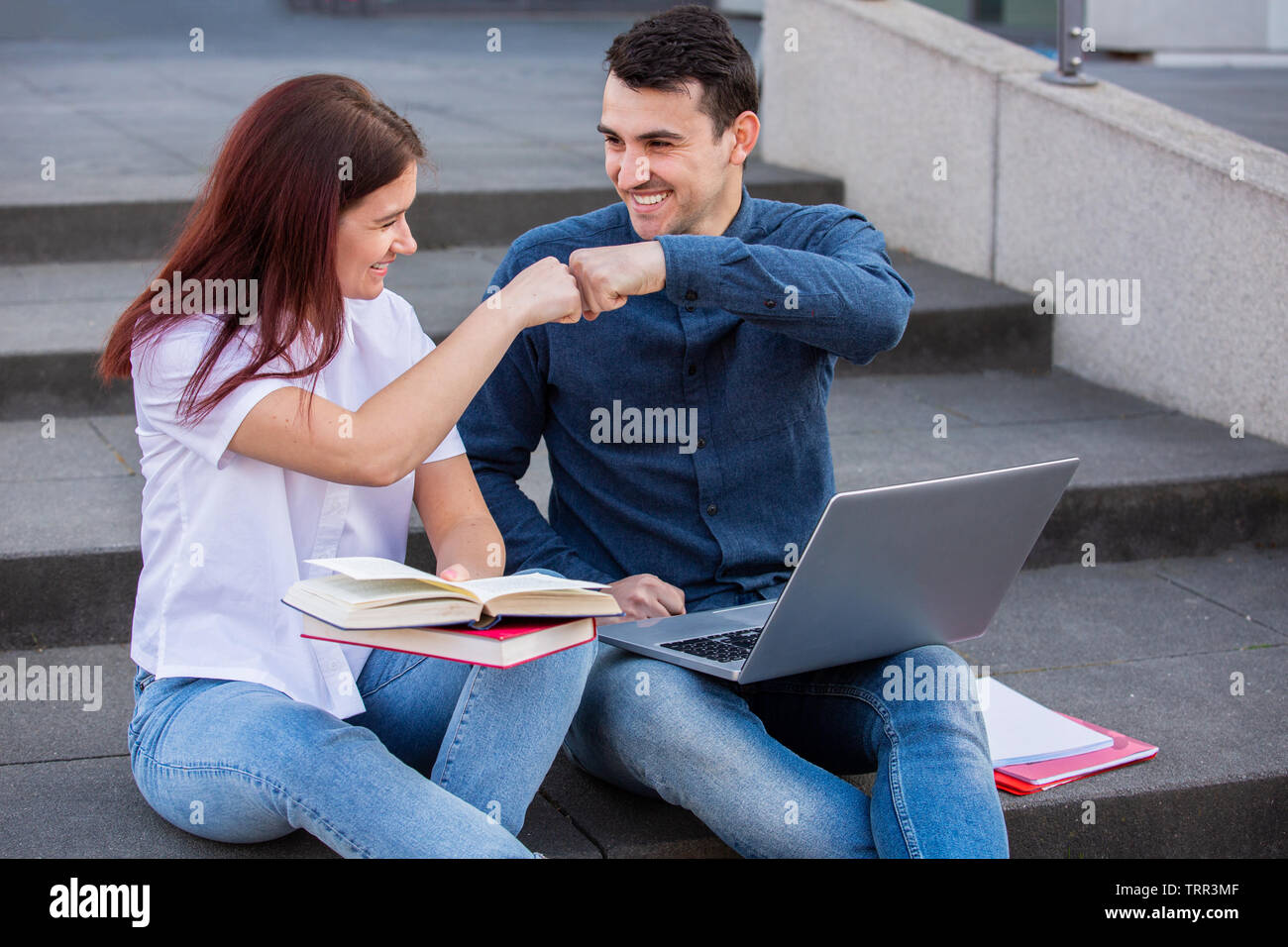 Two students working together classroom hi-res stock photography and ...