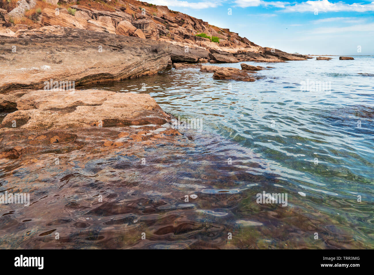 Rocky shore clean sand hi-res stock photography and images - Alamy