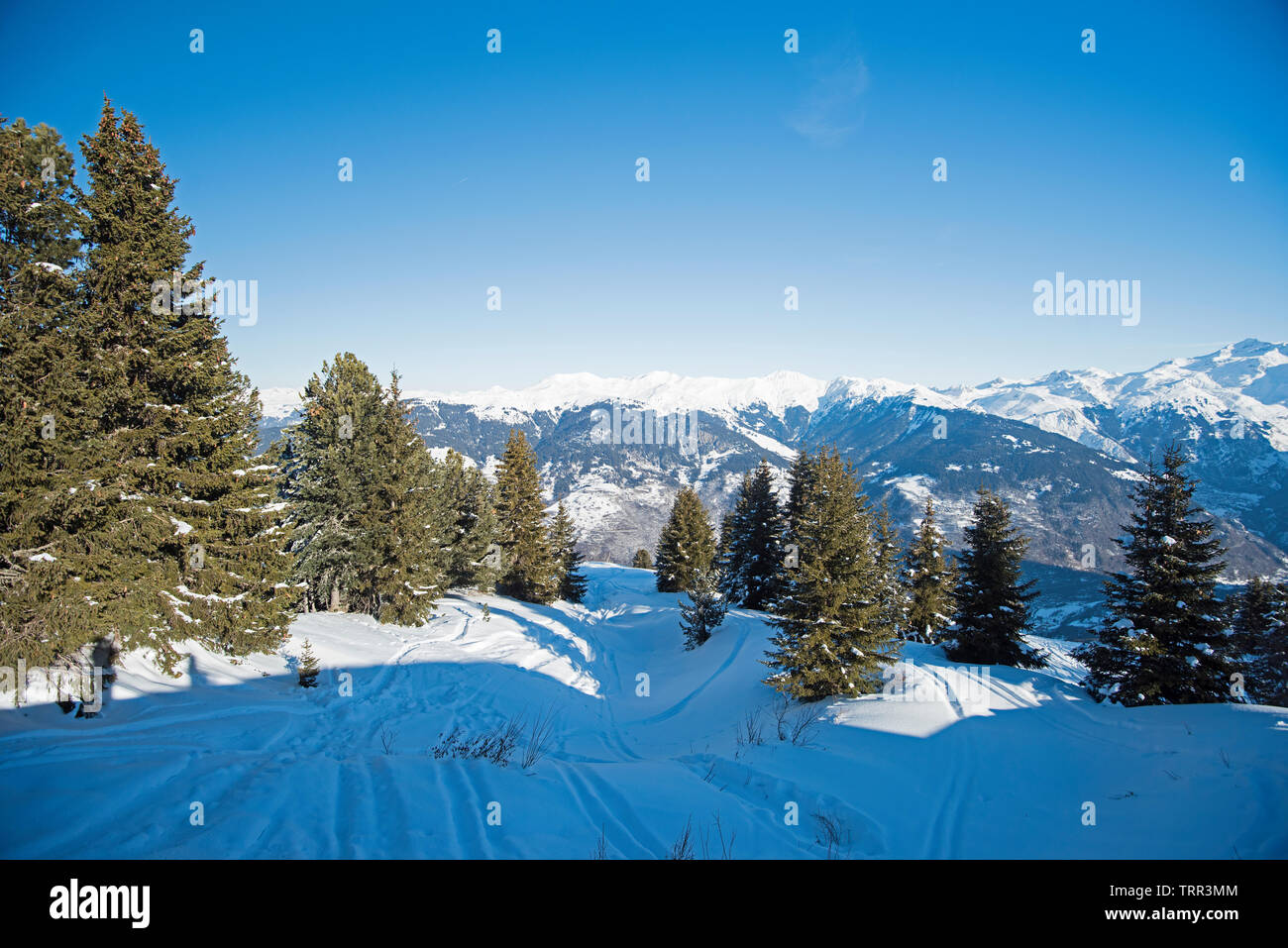 Panoramic view across to snow covered mountain range hi-res stock ...