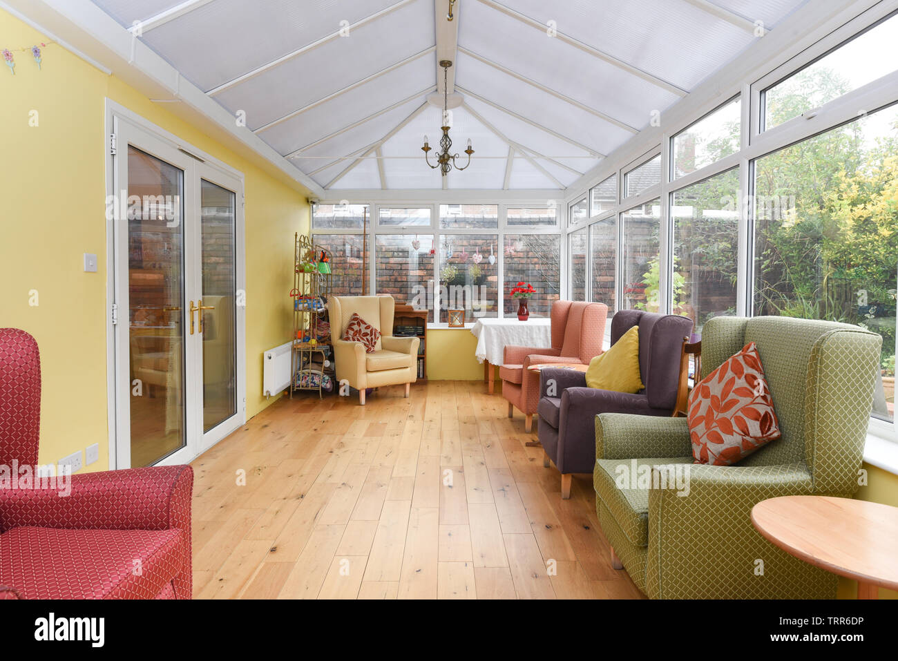 Large conservatory with seating Stock Photo - Alamy