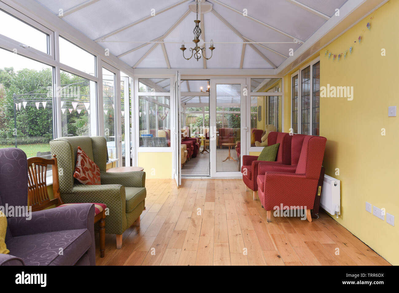 Large conservatory with seating Stock Photo - Alamy