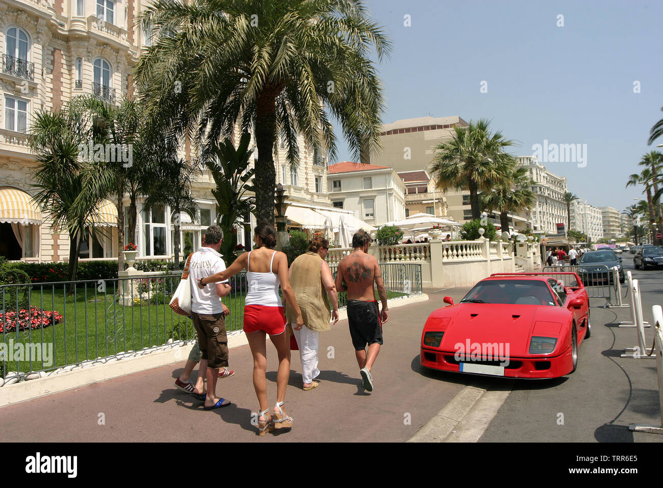 People walking at famous La Croisette Boulevard in Cannes, France Stock ...
