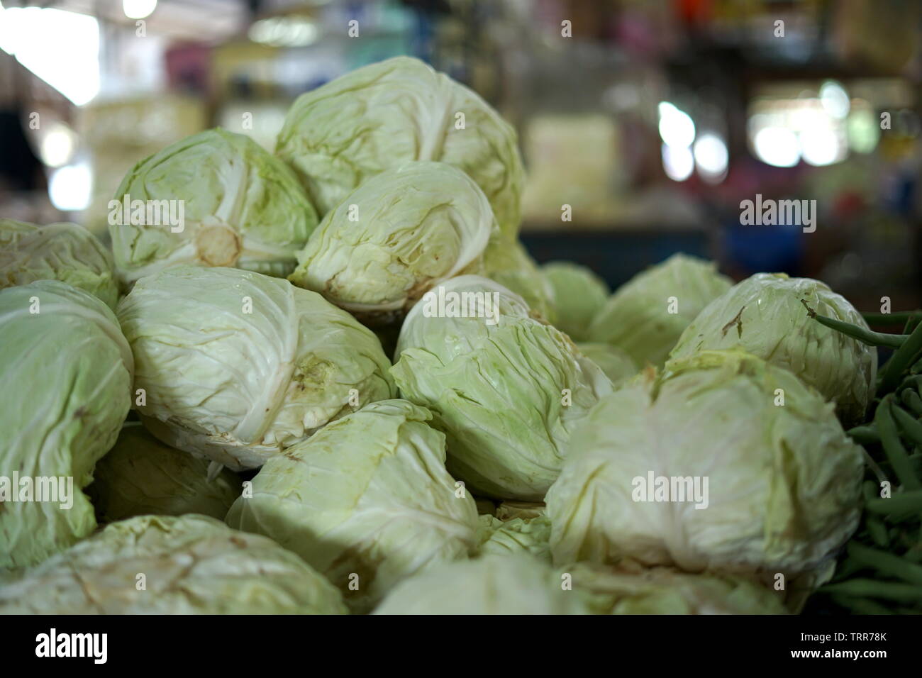 Cabbage for sale at Traditional vegetable market stall Stock Photo - Alamy