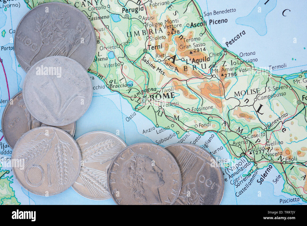 Various Italian coins on a map Stock Photo - Alamy
