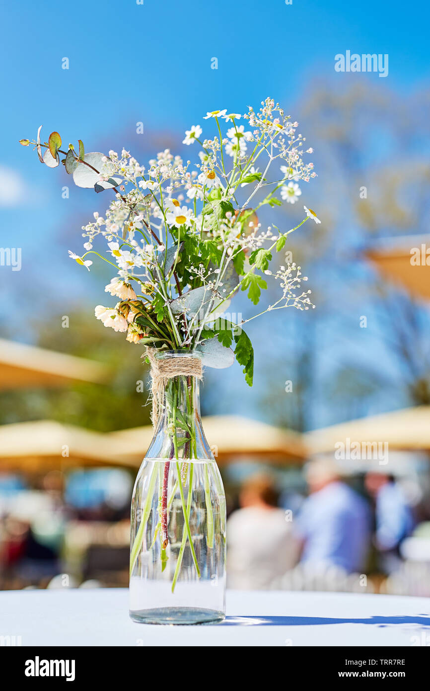 Spring flowers in a transparent vase Stock Photo - Alamy