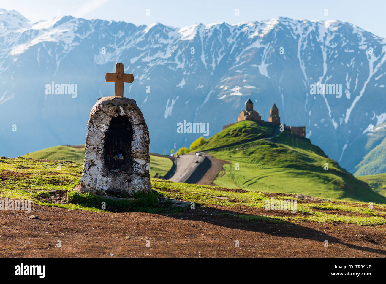 The old church of the Holy Trinity at dawn in the mountains of Georgia ...