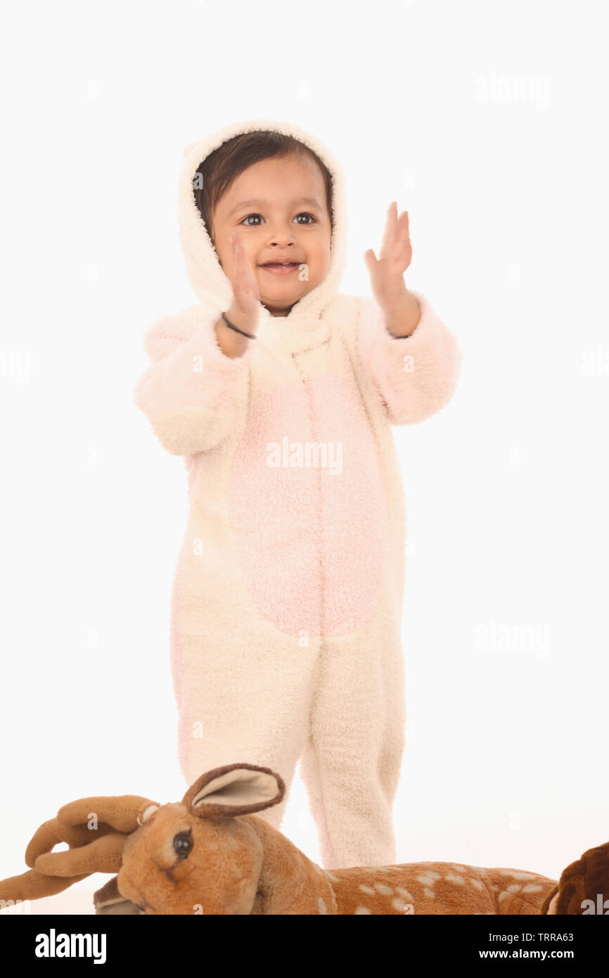 Indian baby boy clapping hands Stock Photo - Alamy