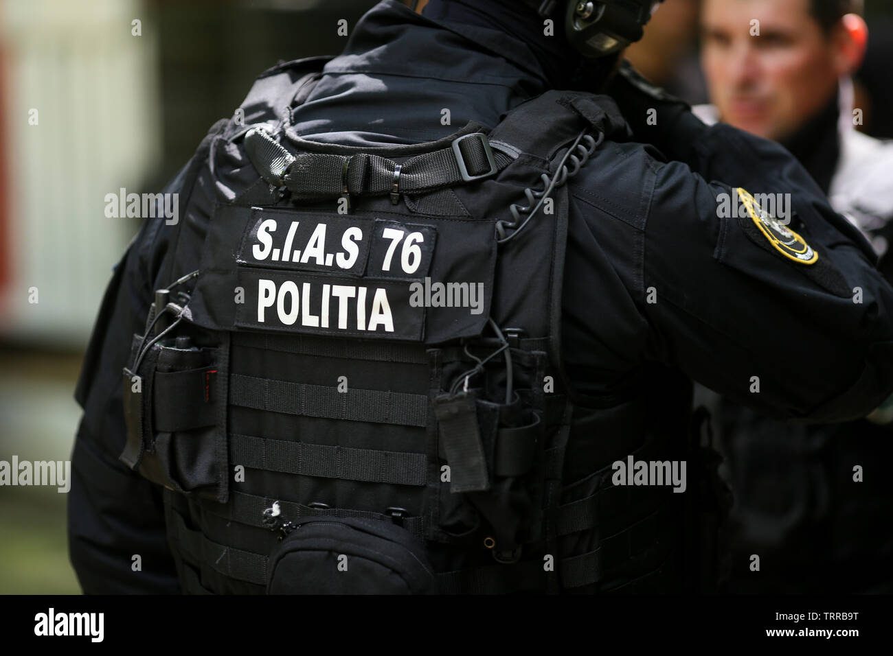Black swat team uniform hi-res stock photography and images - Alamy