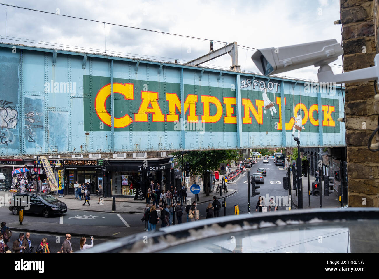Security CCTV camera in foreground overlooking Camden Marketplace and ...